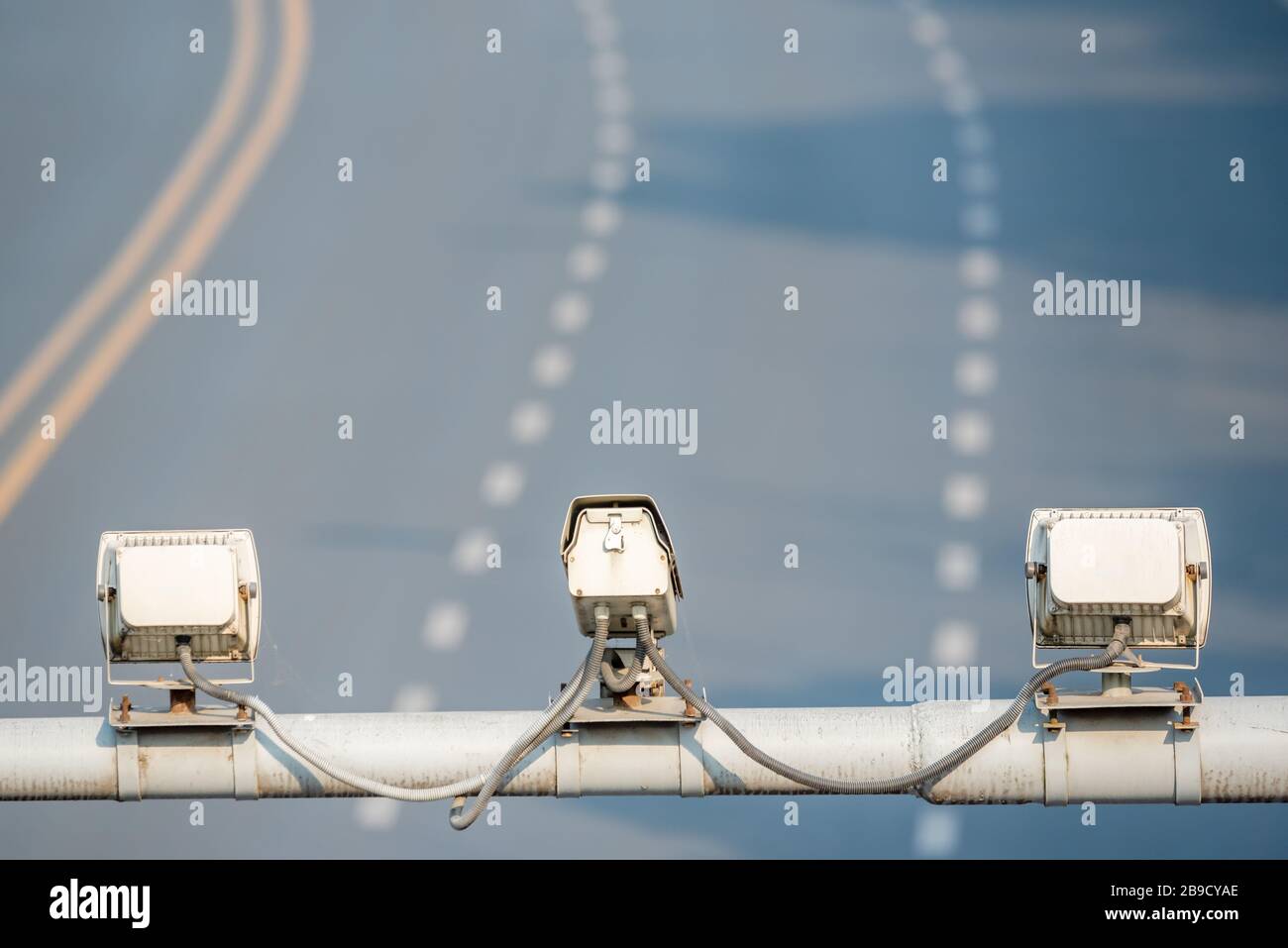 Speed cameras monitoring traffic road above empty road in Chengdu ...