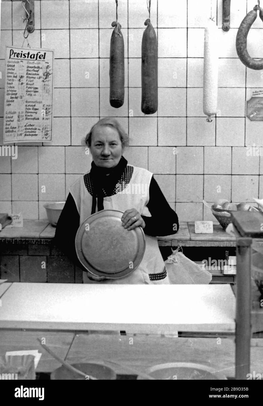 Woman butcher shop Black and White Stock Photos & Images - Alamy