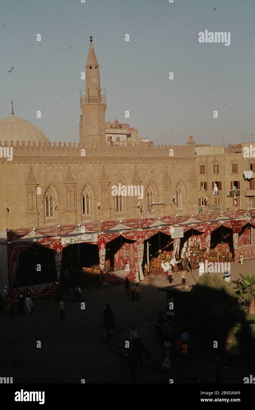 The decorated Hussein Square between the minaret of the mosque of the ...