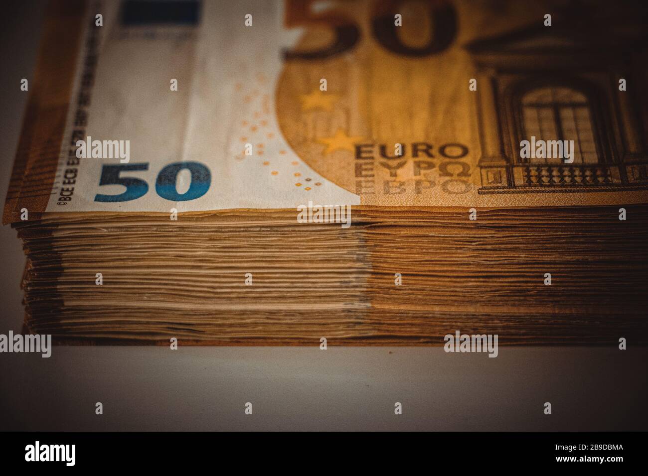 A pack of 50 euro bills, from side Stock Photo - Alamy