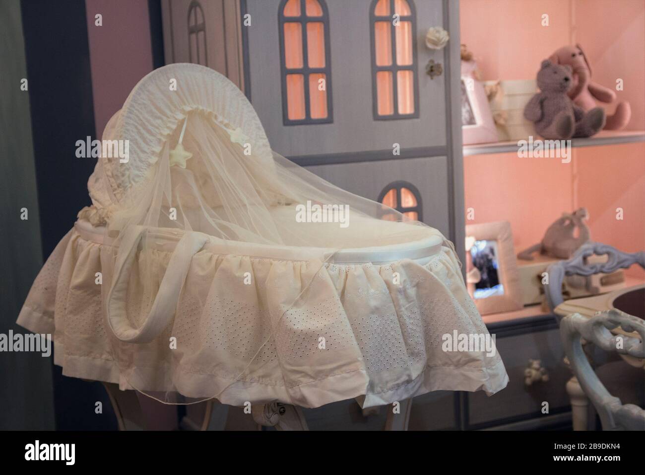 White cradle against the wall with a photocopier space in the interior ...