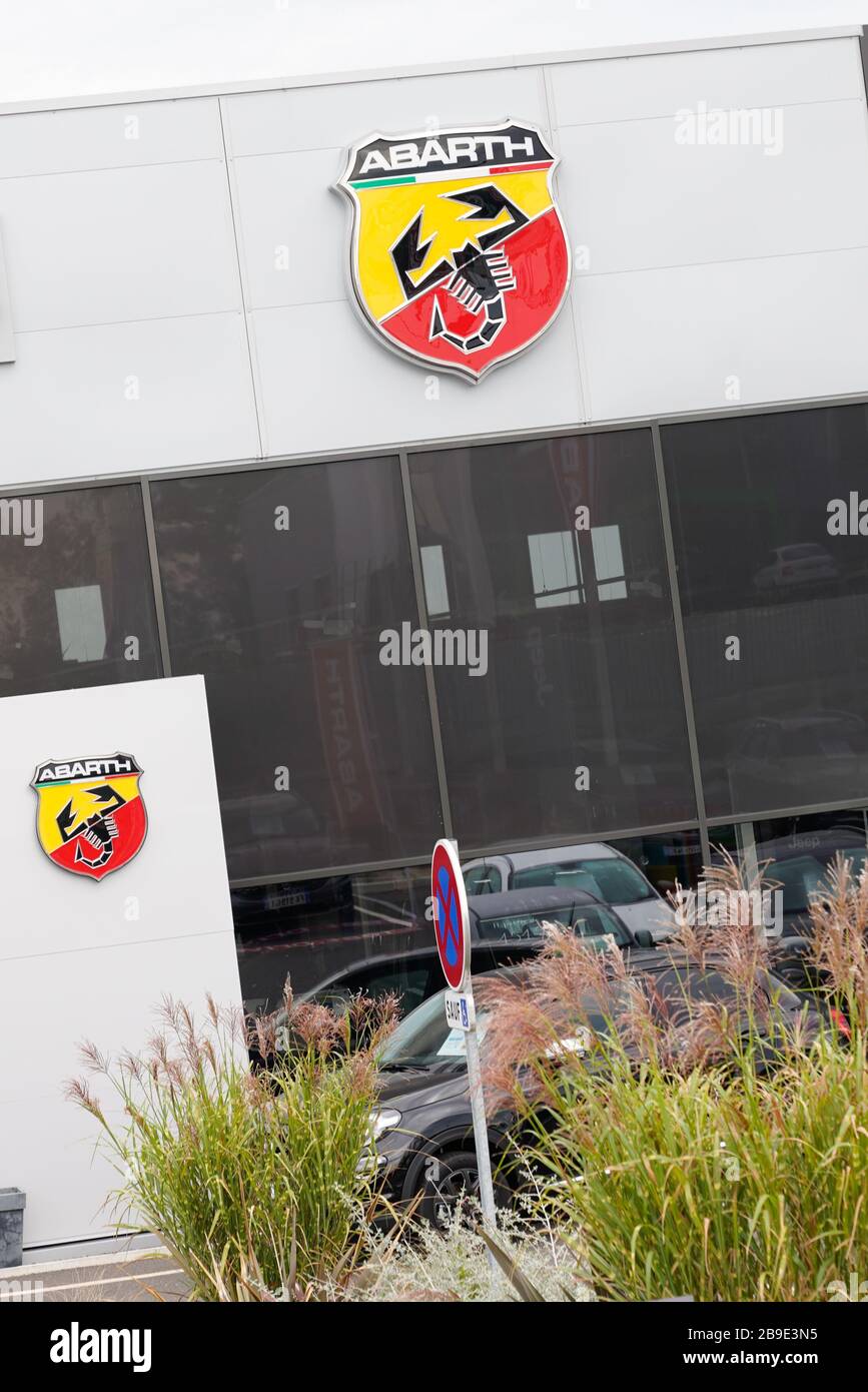 Abarth car dealership automobiles sign logo store Stock Photo - Alamy