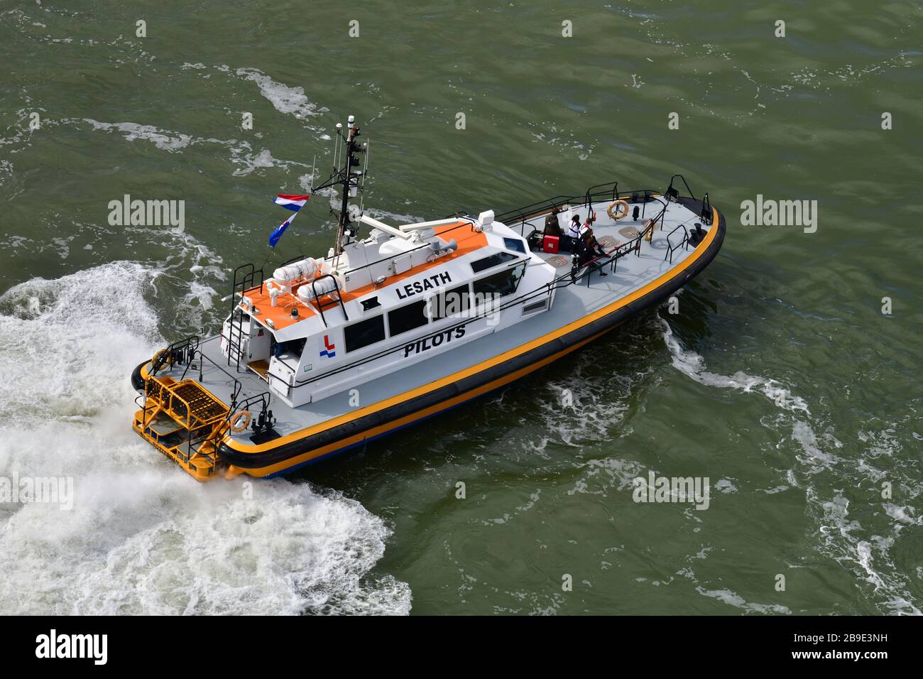 Yellow Pilot boat seen from above on the Maas river in Rotterdam Stock ...
