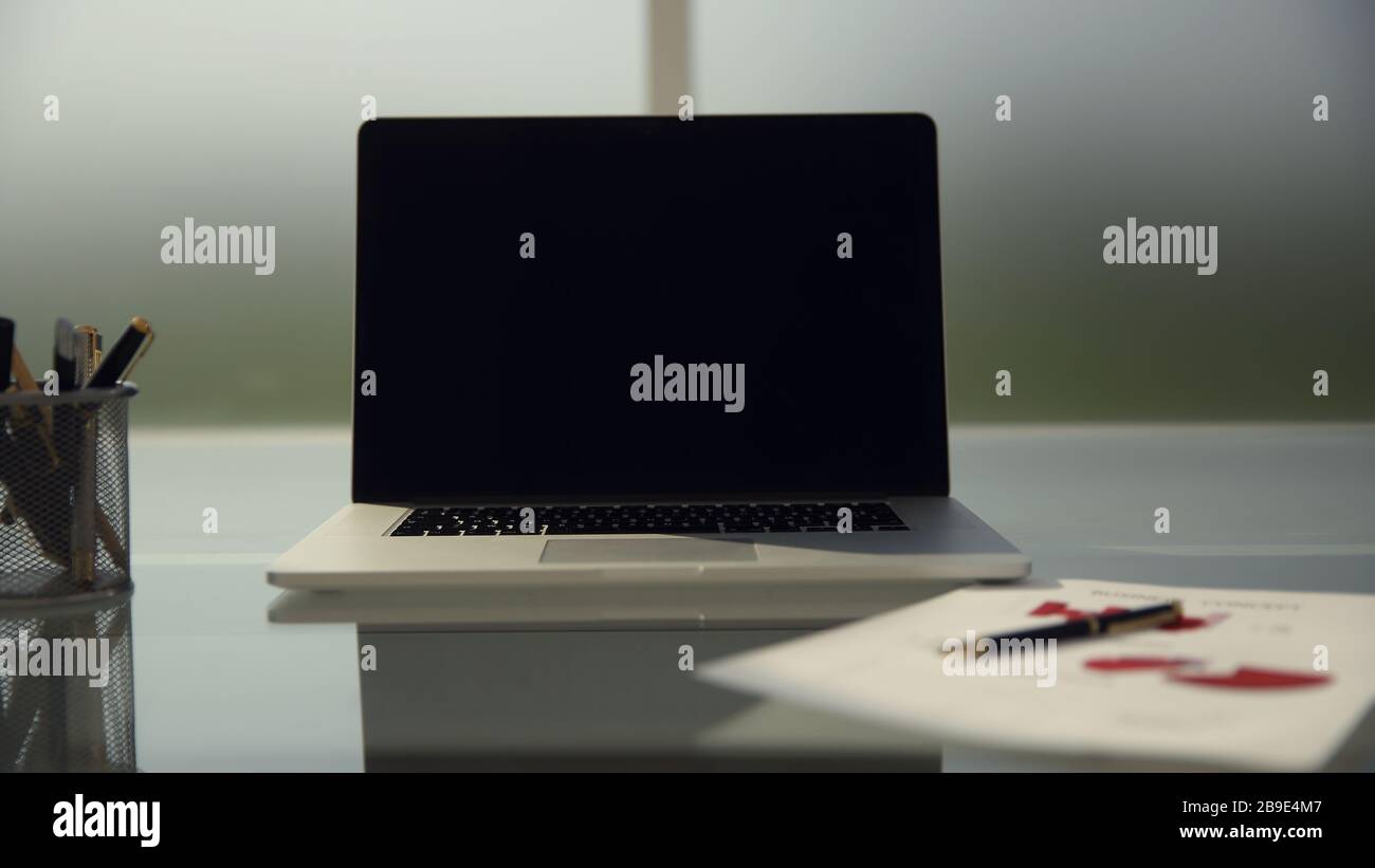 open laptop on Desk in empty office .photo with copy space Stock Photo ...