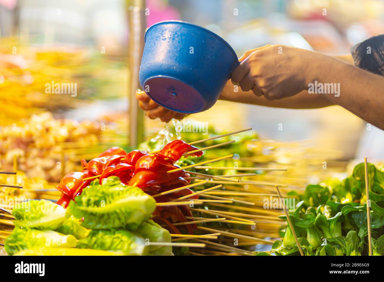 Fresh colored vegetables on a street food store counter Stock Photo - Alamy