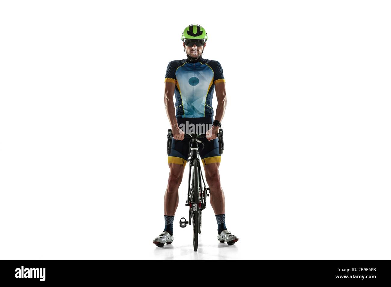 Triathlon male athlete cycle training isolated on white studio ...