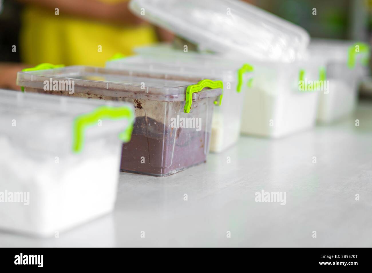 Kitchen, plastic transparent box with flour. Ingredients for cooking ...