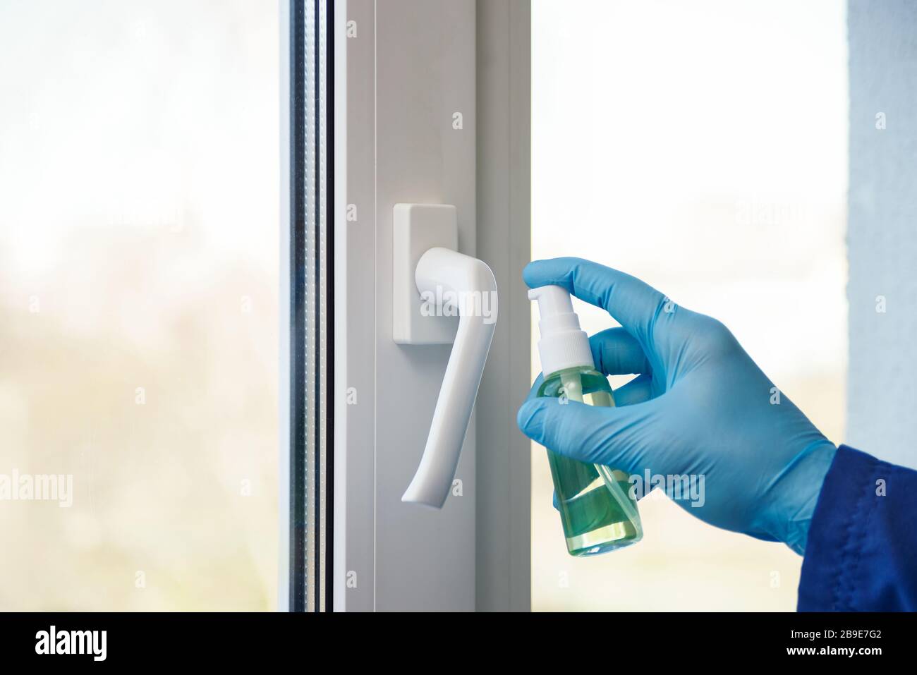 sanitizer disinfection of handles on windows and doors in rooms Stock ...