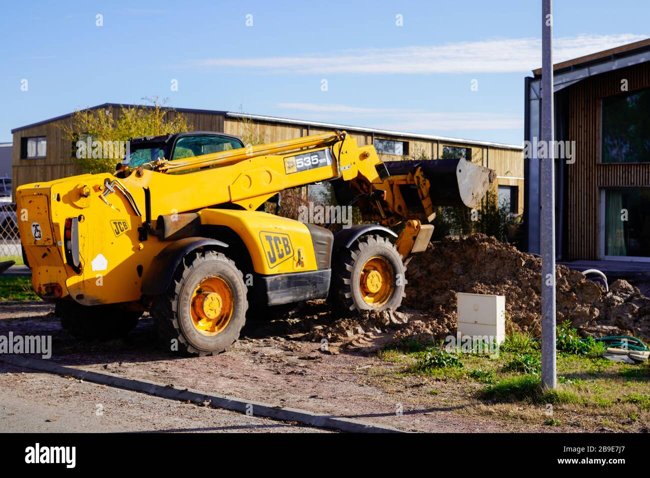 Bordeaux , Aquitaine / France - 03 03 2020 : JCB wheeled backhoe yellow ...
