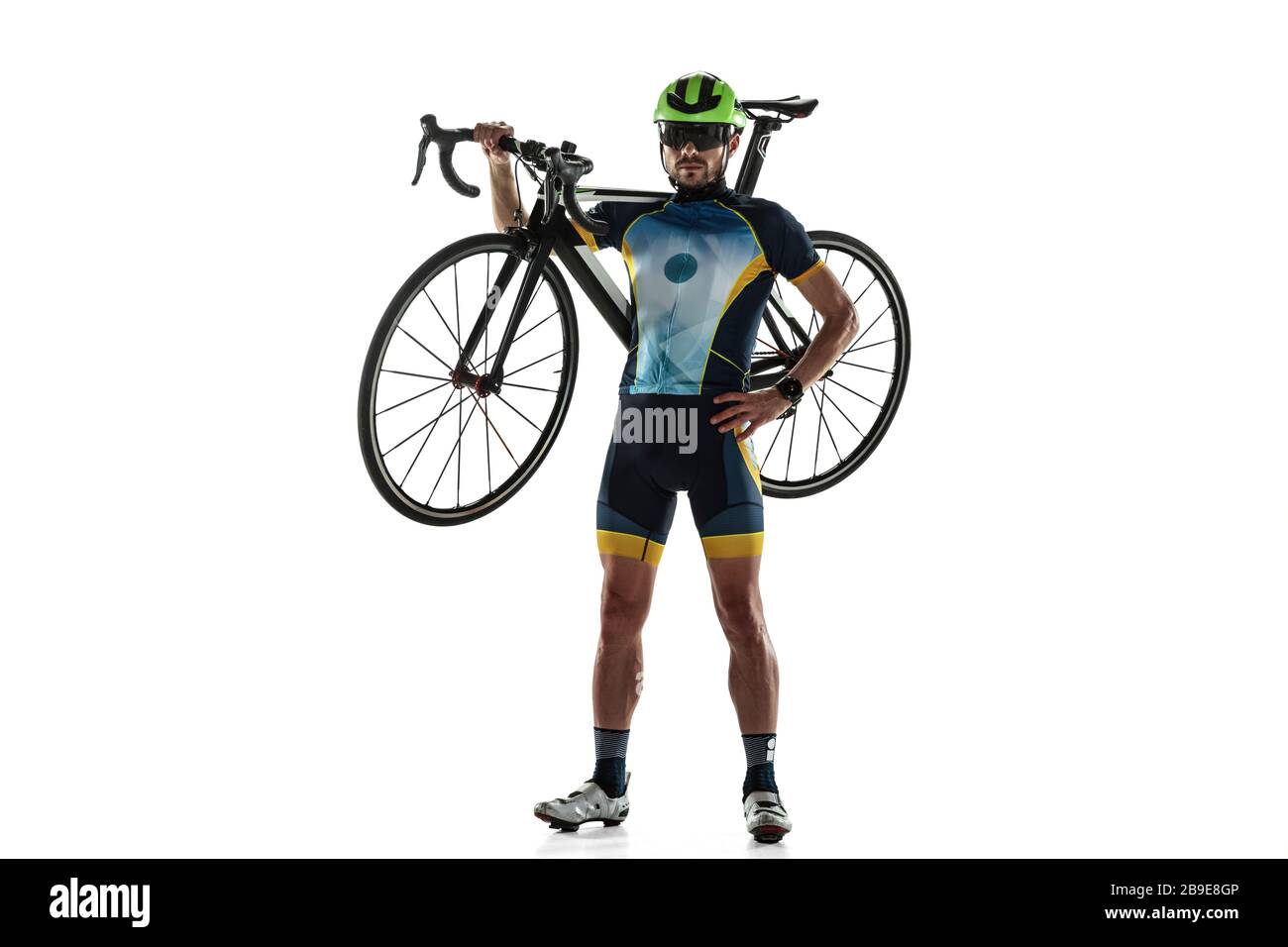 Triathlon male athlete cycle training isolated on white studio ...