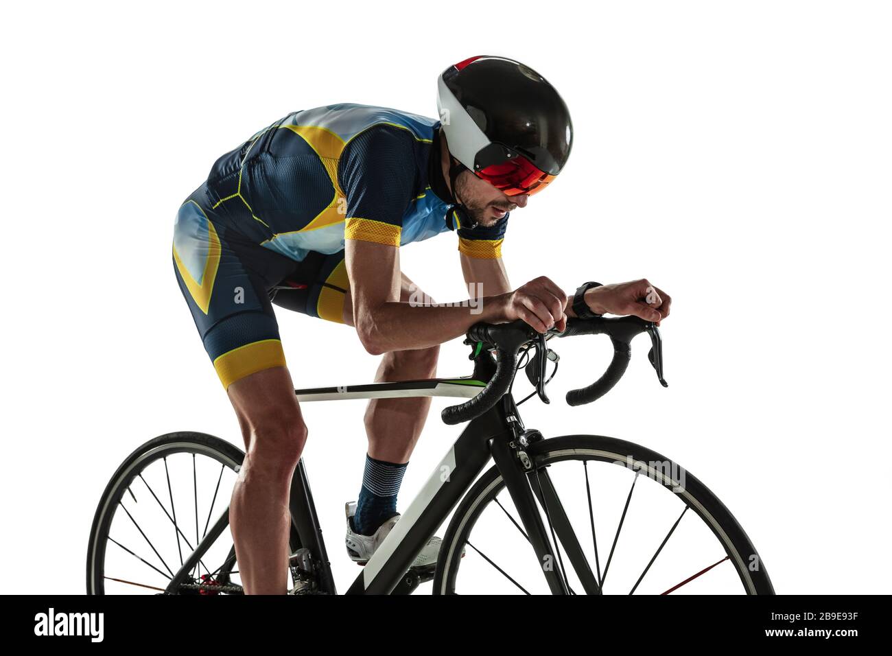 Triathlon male athlete cycle training isolated on white studio ...