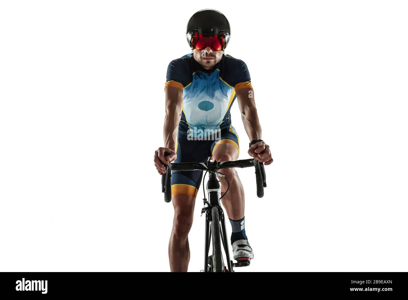 Triathlon male athlete cycle training isolated on white studio ...