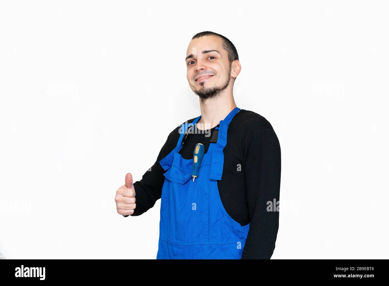 Professional repair, installation and maintenance technician. In a work ...