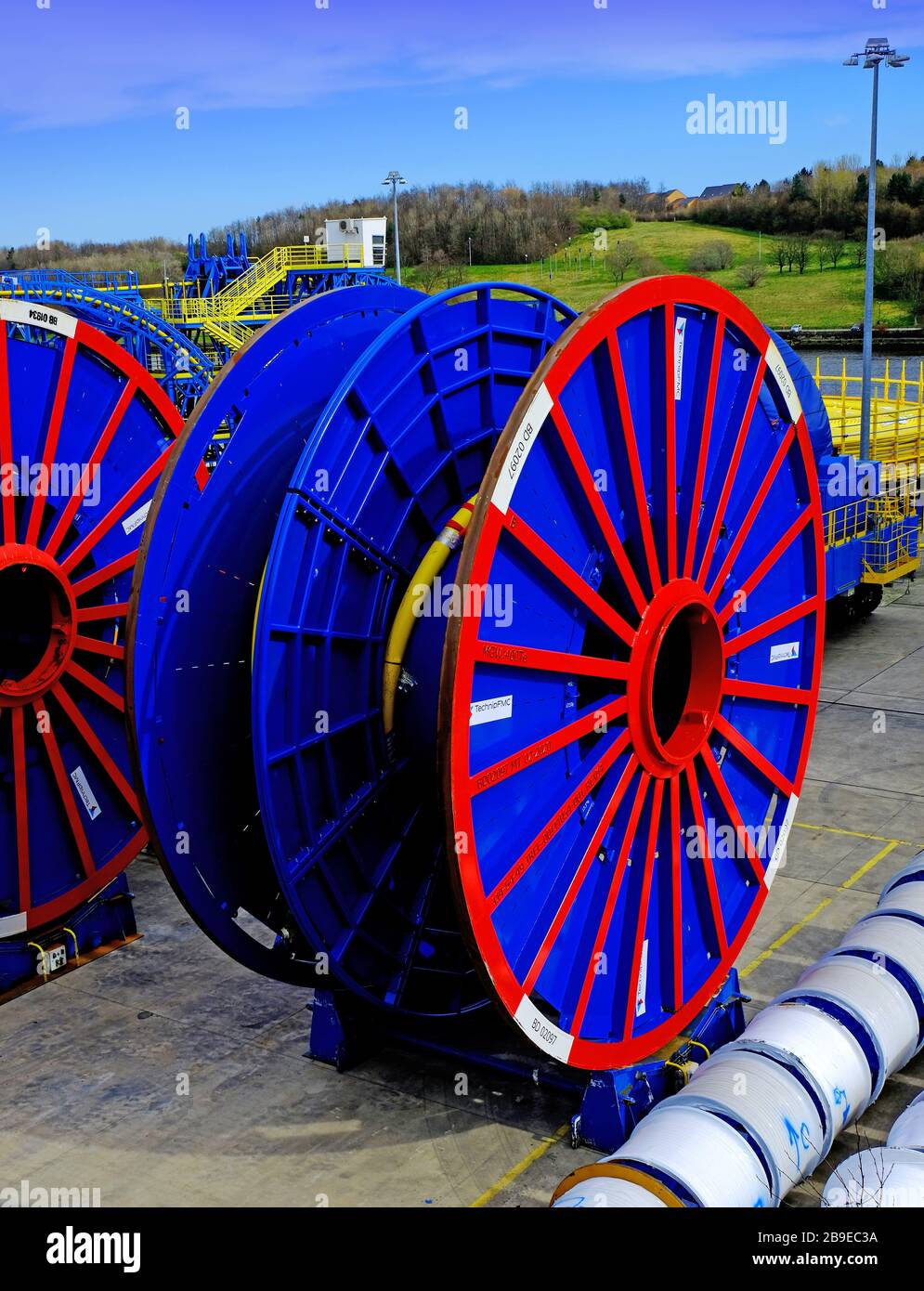 Large undersea cable reels in Wallsend shipyard Stock Photo - Alamy