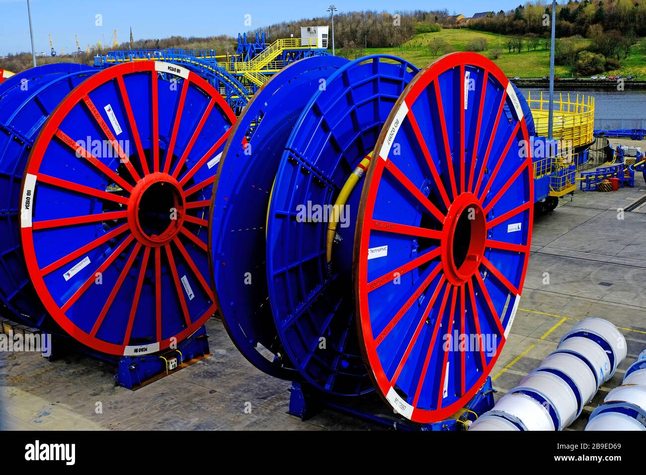 Large undersea cable reels in Wallsend shipyard Stock Photo - Alamy