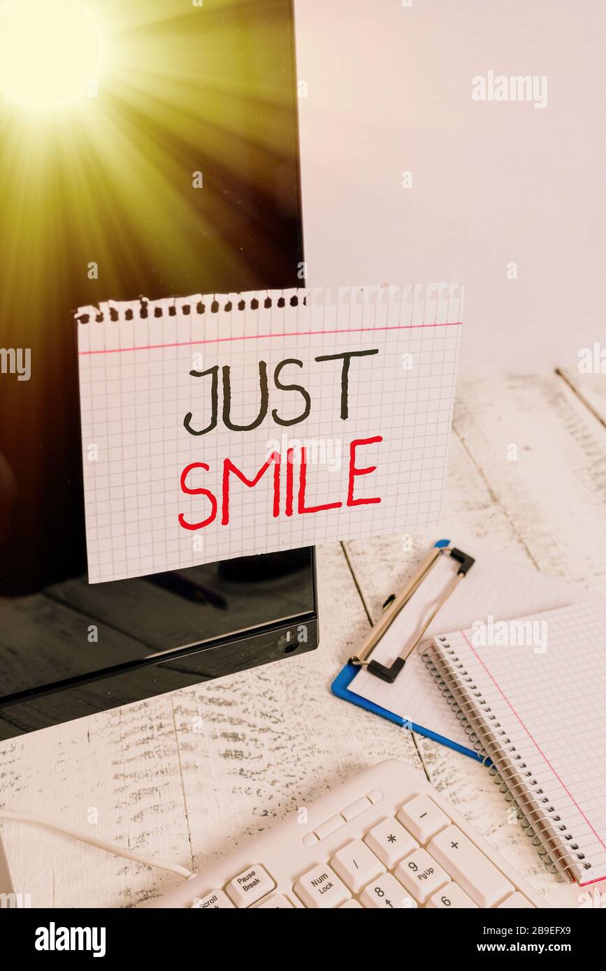 Writing note showing Just Smile. Business concept for assume a facial ...