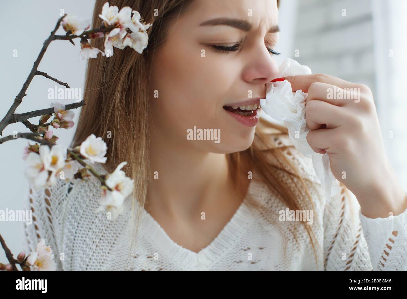 The woman has a spring allergy Stock Photo - Alamy