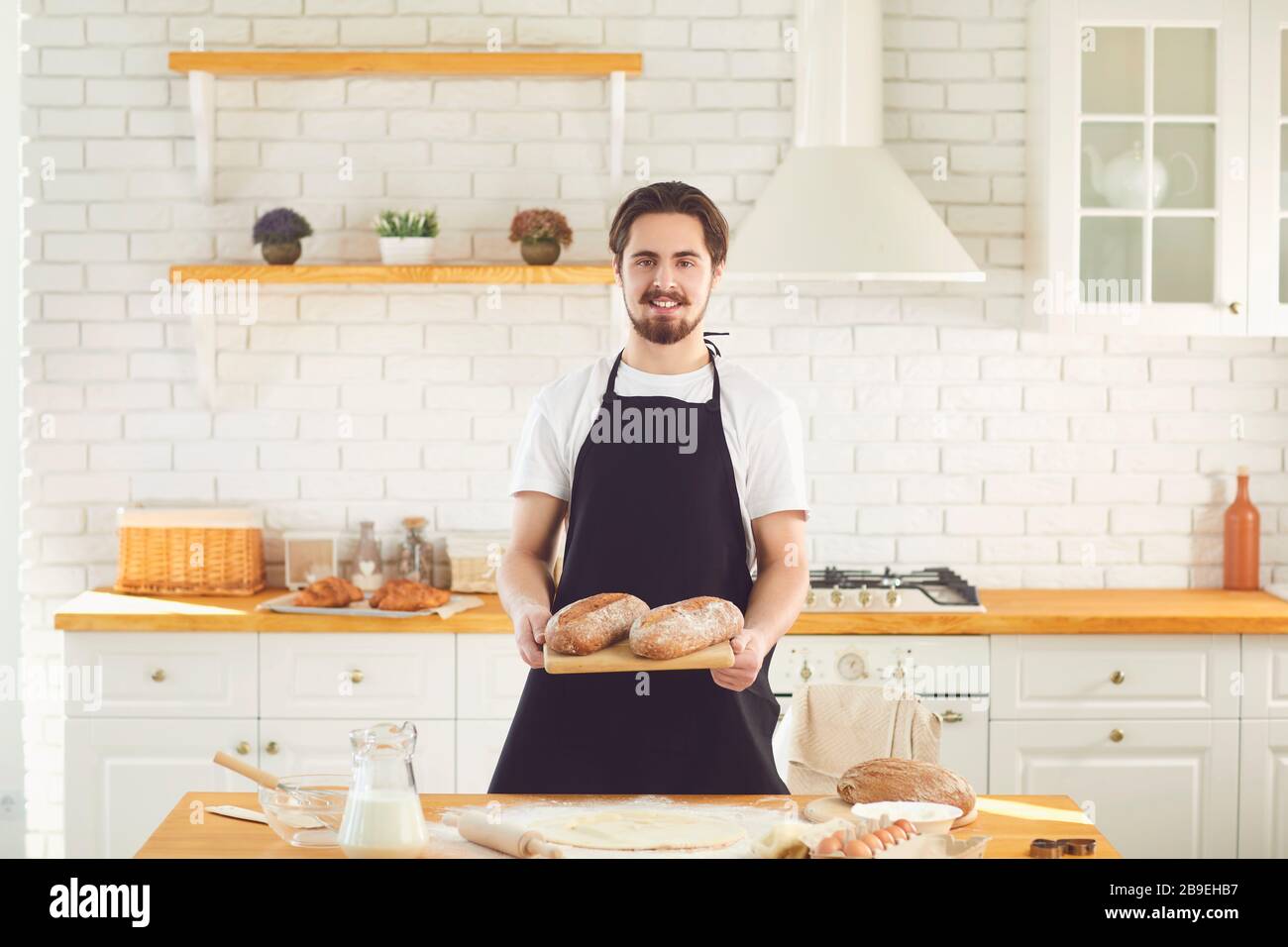 Baker man bearded holds hi-res stock photography and images - Alamy