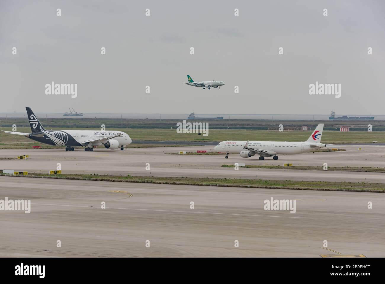 Shanghai, China - May 14, 2019: holding apron of Shanghai Pudong International Airport ...