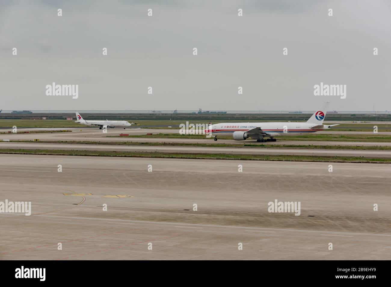 Shanghai, China - May 14, 2019: holding apron of Shanghai Pudong International Airport ...