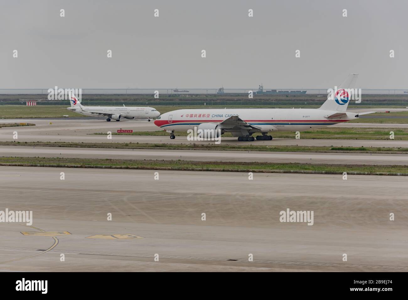 Shanghai, China - May 14, 2019: holding apron of Shanghai Pudong International Airport ...