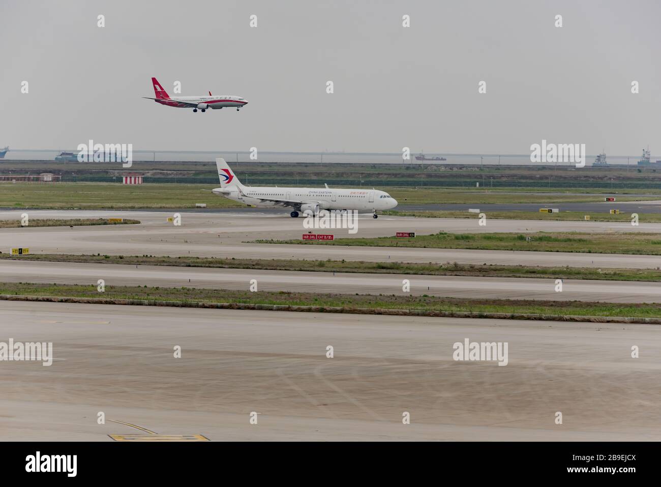 Shanghai, China - May 14, 2019: holding apron of Shanghai Pudong International Airport ...