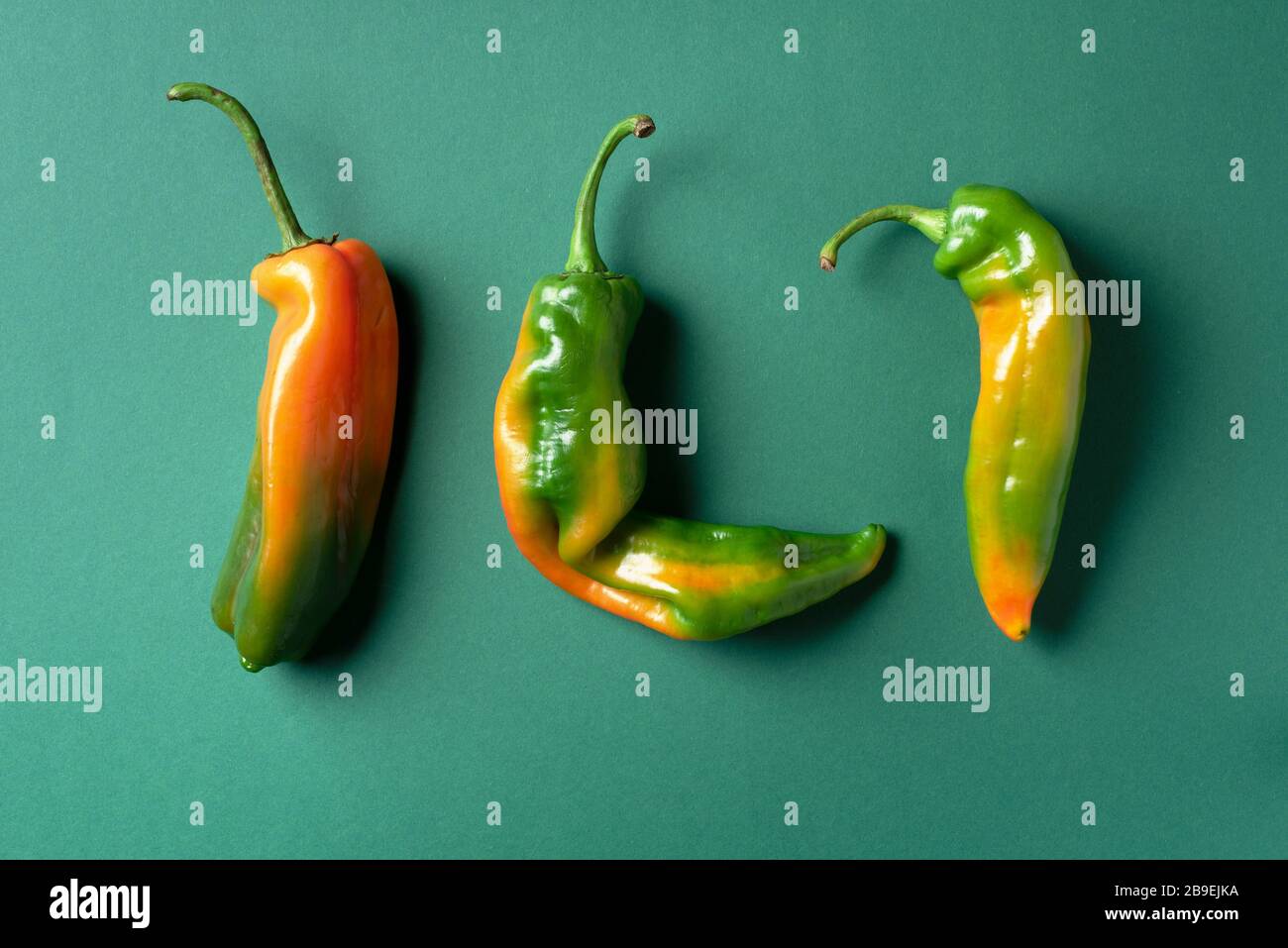 Ugly bell pepper on green background. Concept of zero waste production ...
