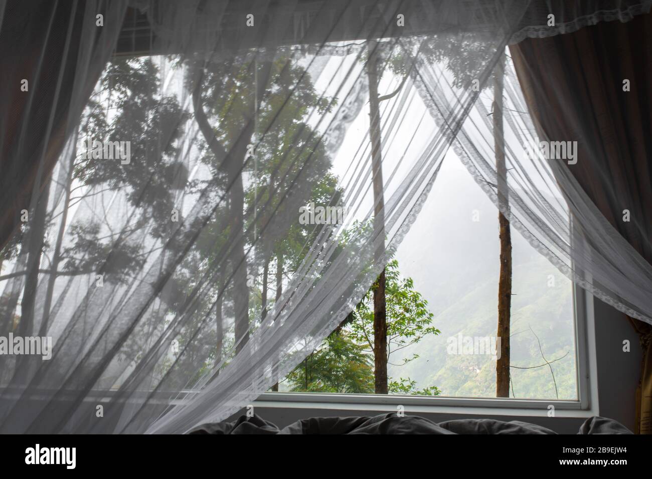 View of the mountain from the window Stock Photo - Alamy
