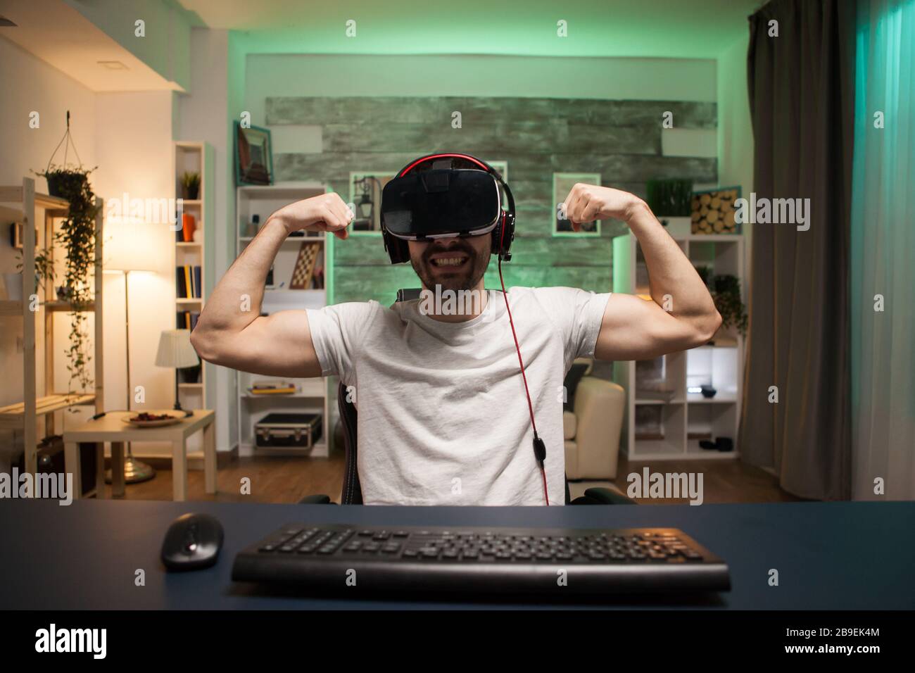 Pov of professional gamer flexing his muscle celebrating his victory on ...