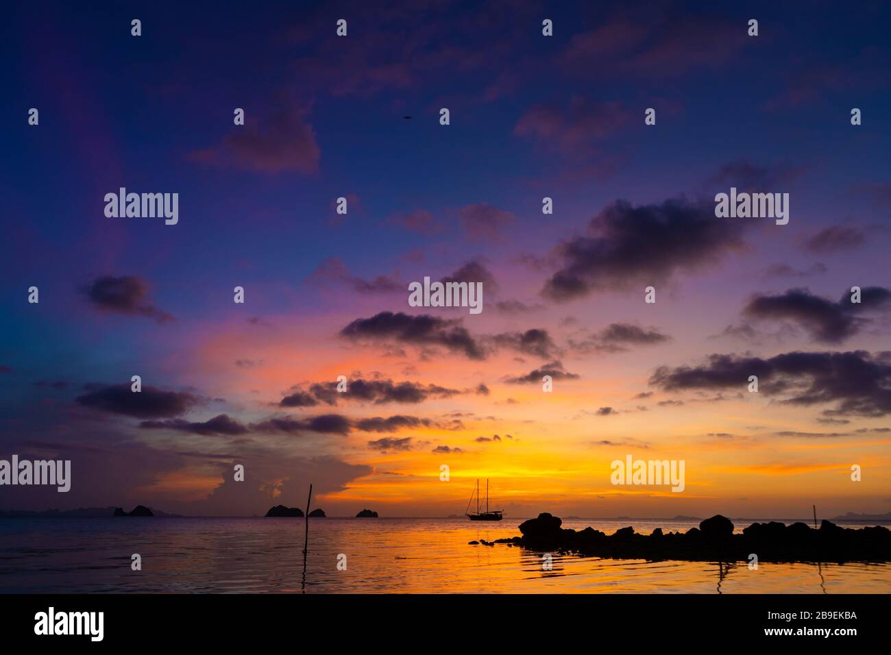 Colorful sunset on a tropical beach. Orange sunset on the ocean ...