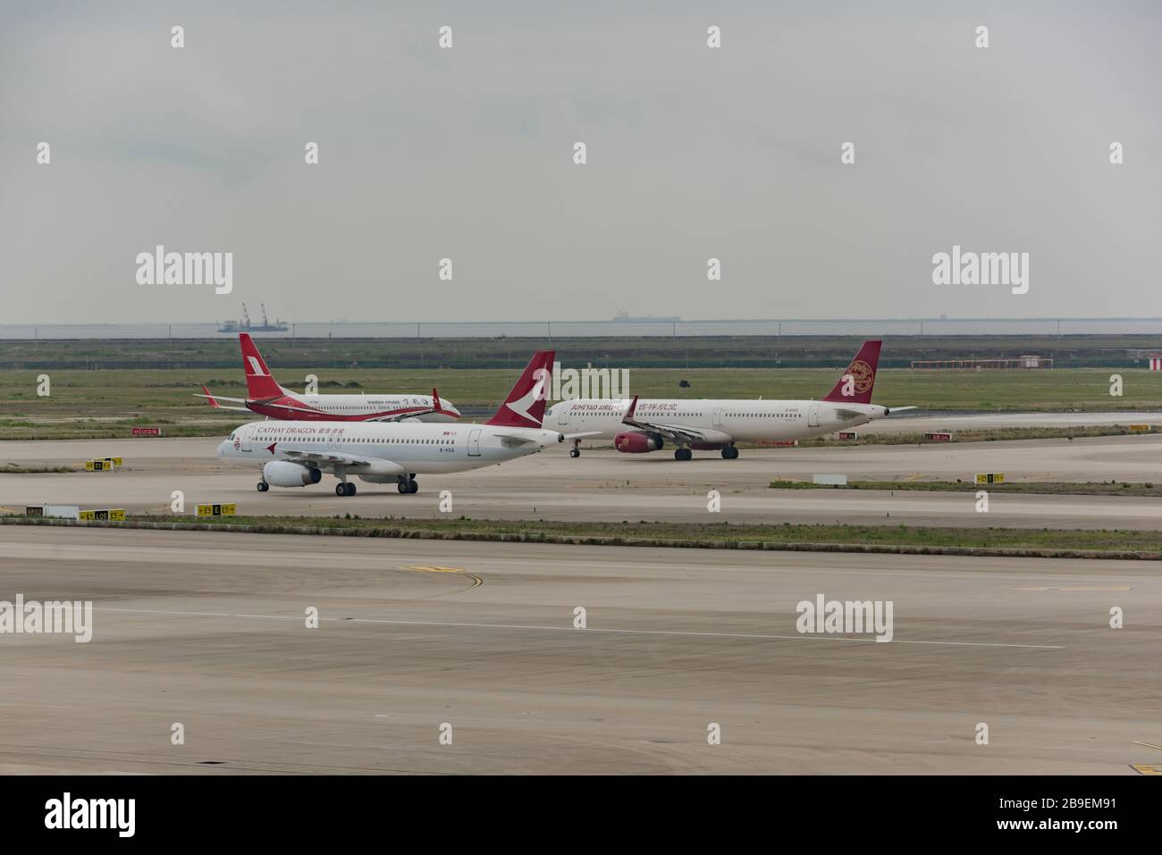 Shanghai, China - May 14, 2019: holding apron of Shanghai Pudong International Airport ...