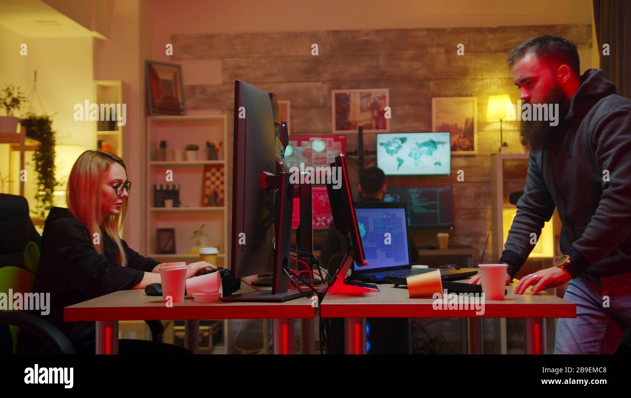 Team of hackers running while the police is coming to catch them Stock ...