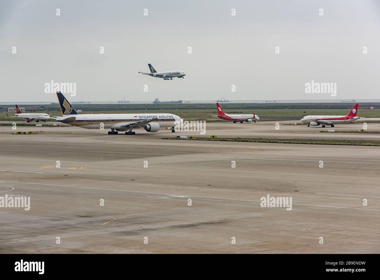 Shanghai, China - May 14, 2019: holding apron of Shanghai Pudong International Airport ...