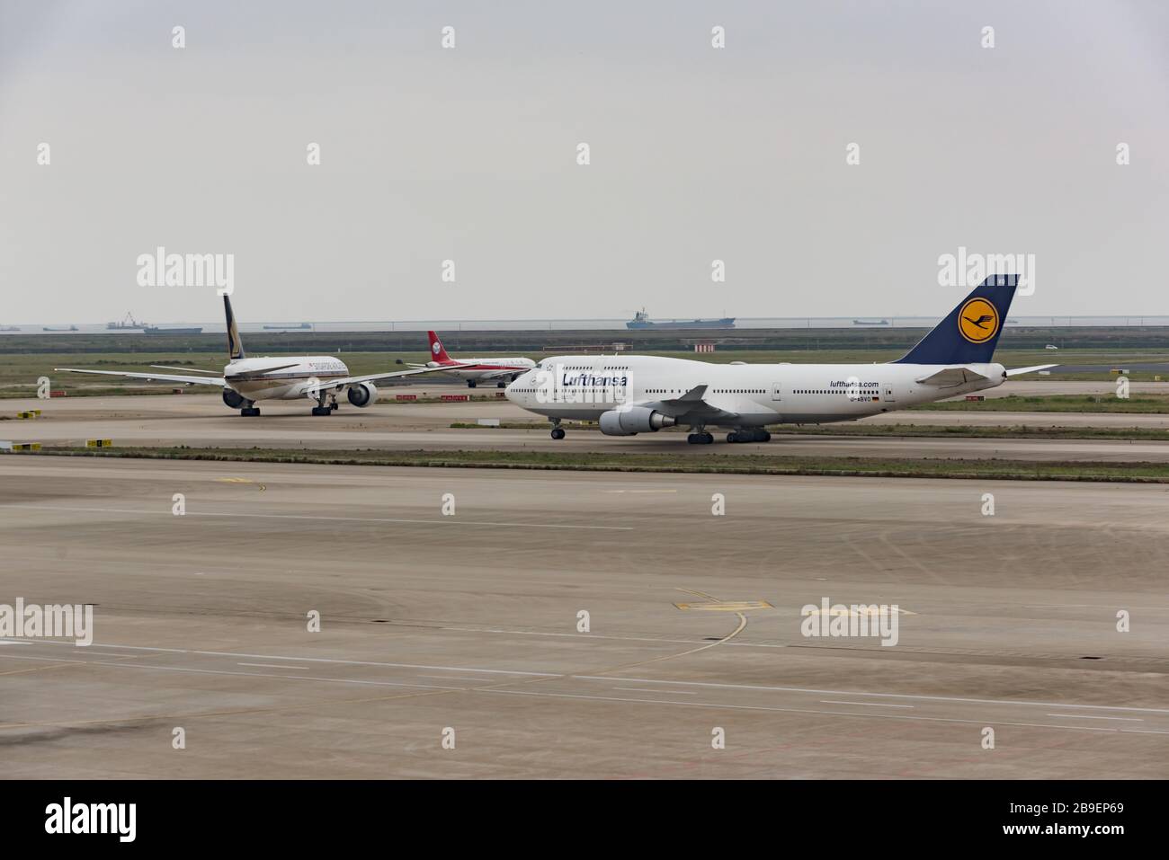 Shanghai, China - May 14, 2019: holding apron of Shanghai Pudong International Airport ...