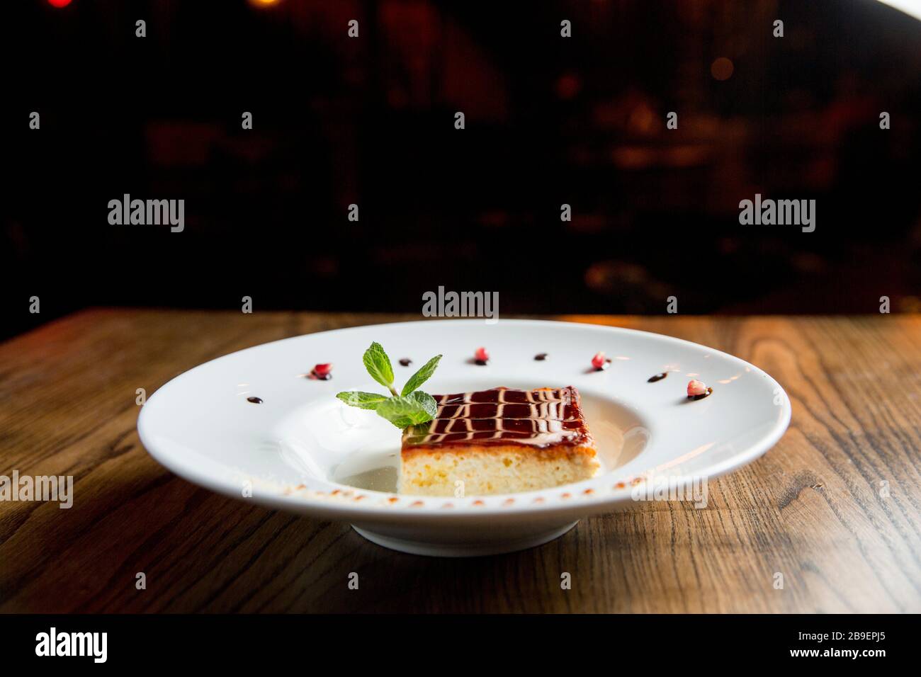 Fresh Tres Leches cake on the plate Stock Photo - Alamy