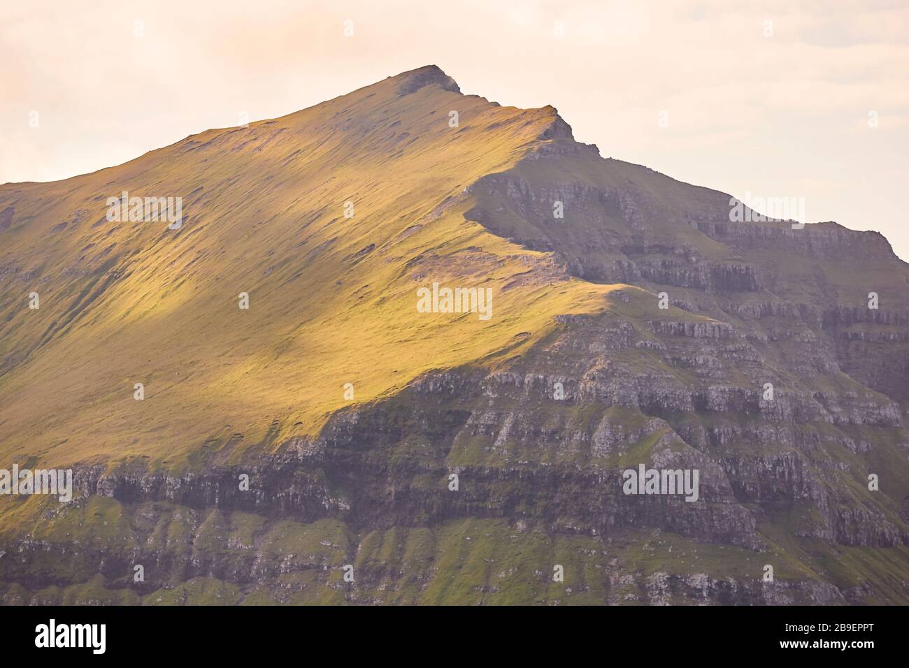 Picturesque green mountain peak landscape in Faroe islands. Sudoroy ...