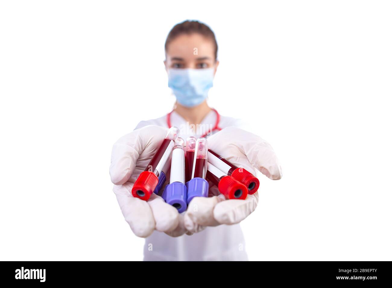 Medical assistent woman with blood test tube on white background ...