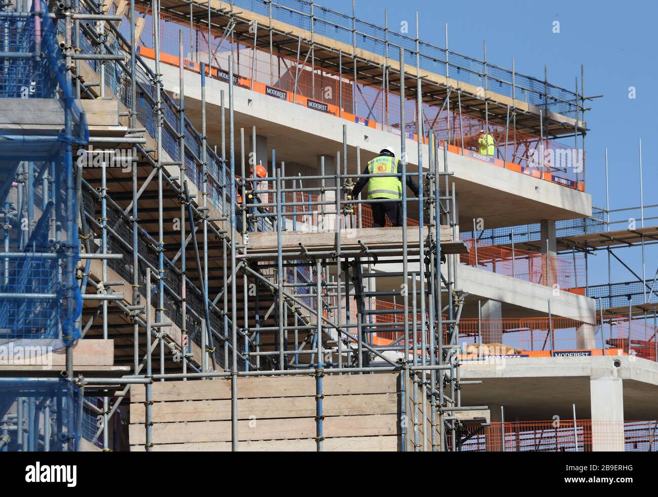 Construction workers waterside quarter development site hi-res stock ...