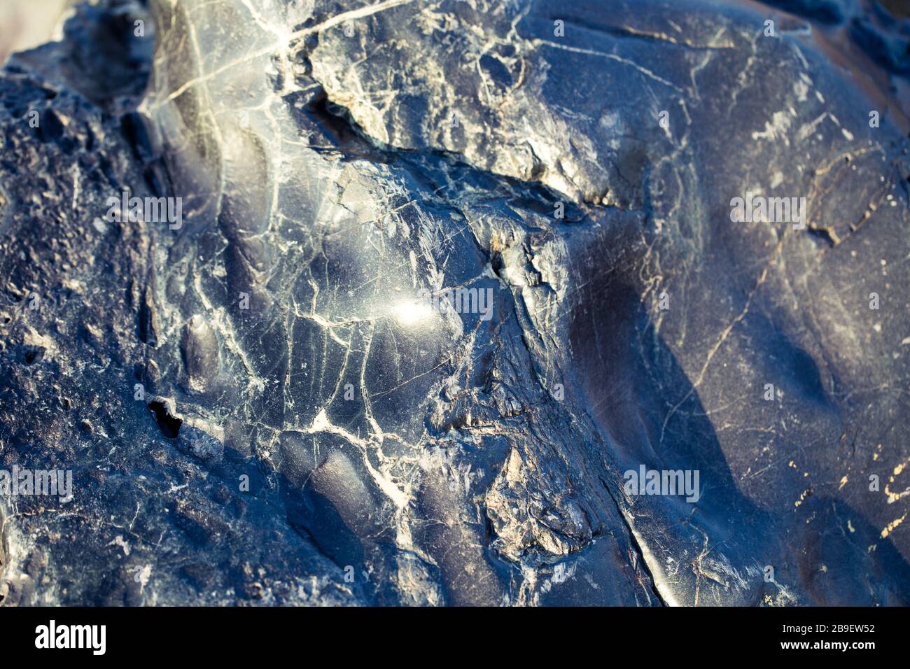 The texture of black volcanic stone. Natural background Stock Photo - Alamy