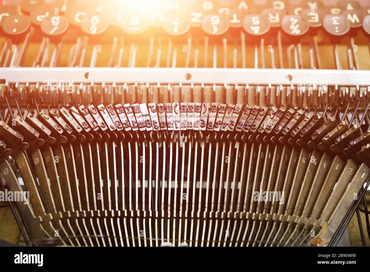 Mechanism of typesetting strikers with the English alphabet in an old ...