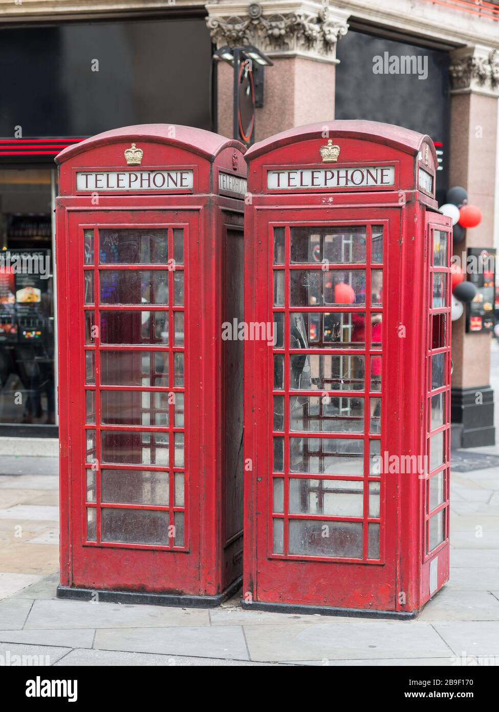 Two Vintage Red Phone Call Boxes in Central London Stock Photo - Alamy