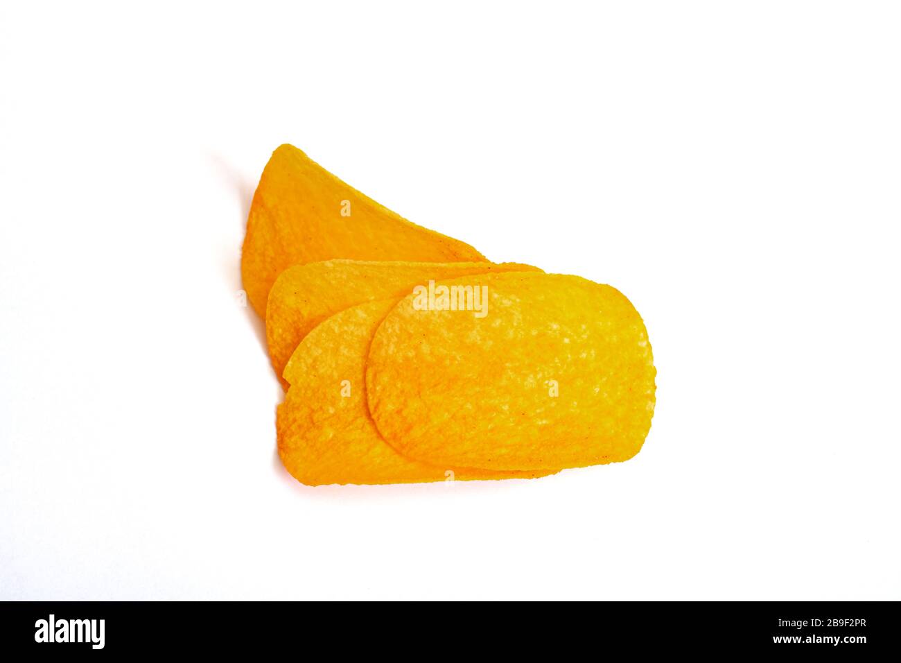 Yellow chips isolated on a white background Stock Photo - Alamy