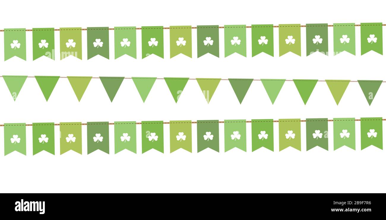 green patterned party flags with clover leaves isolated on white ...