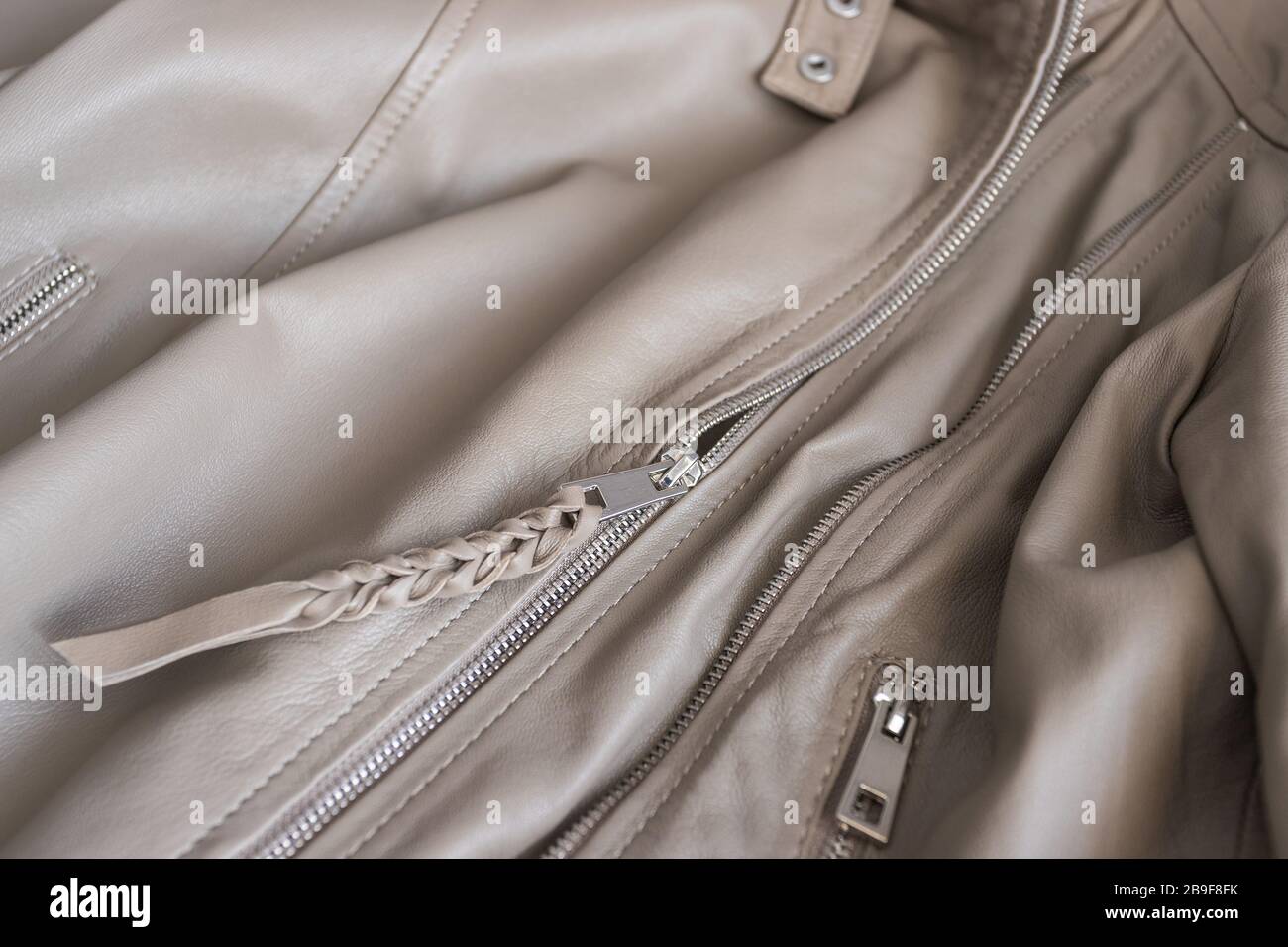 Leather jacket with close up of zipper detail Stock Photo - Alamy