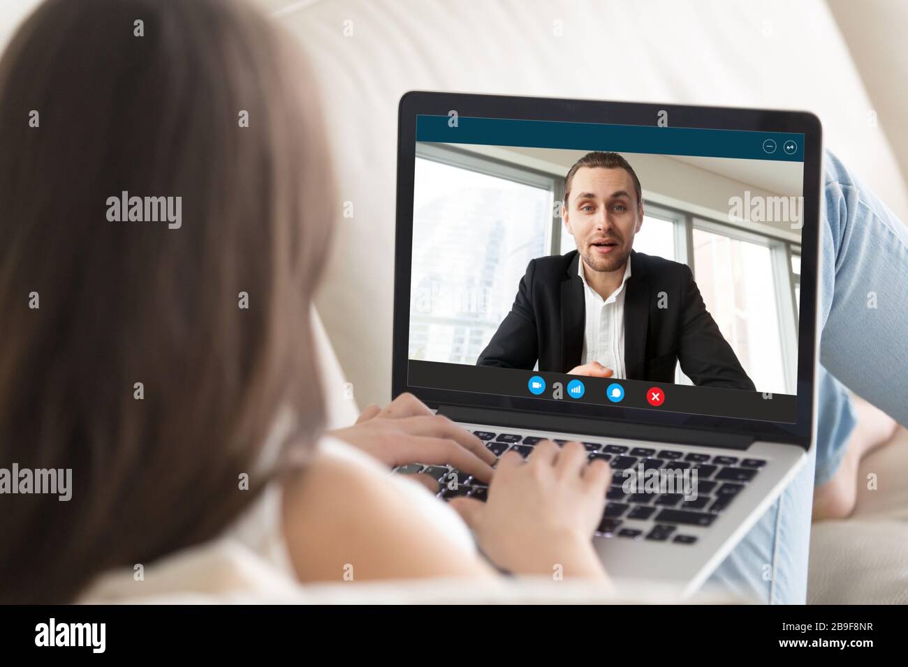 Young female client talk with consultant using video call Stock Photo ...