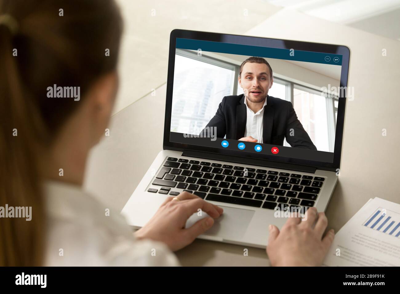 Female employee talk with boss on video call Stock Photo - Alamy