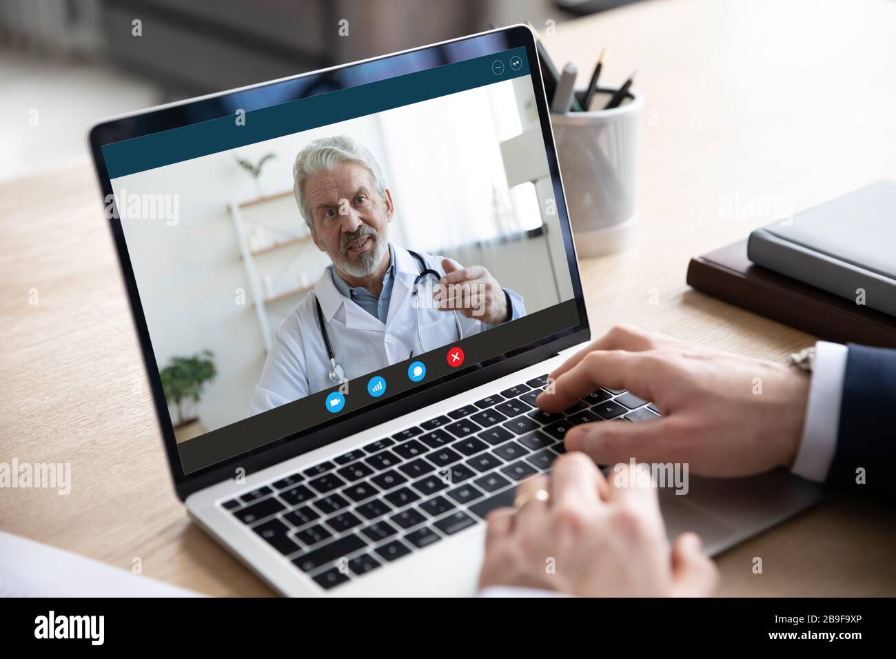 Doctor on video call hi-res stock photography and images - Alamy