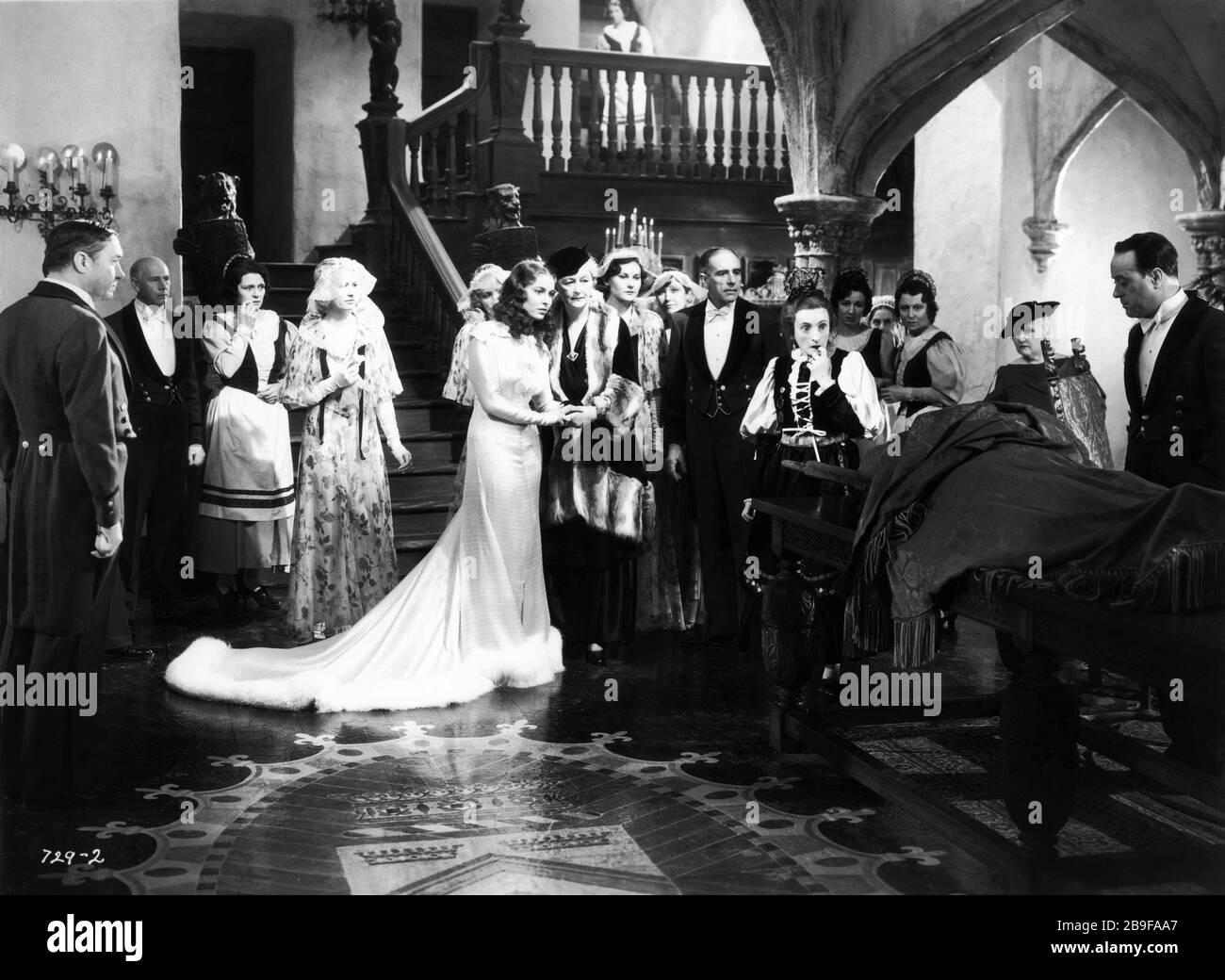 VALERIE HOBSON as Elizabeth Frankenstein and UNA O'CONNOR as Minnie with House Servants in THE ...