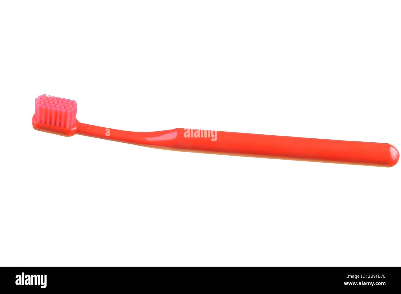 Red toothbrush isolated on the white background Stock Photo - Alamy