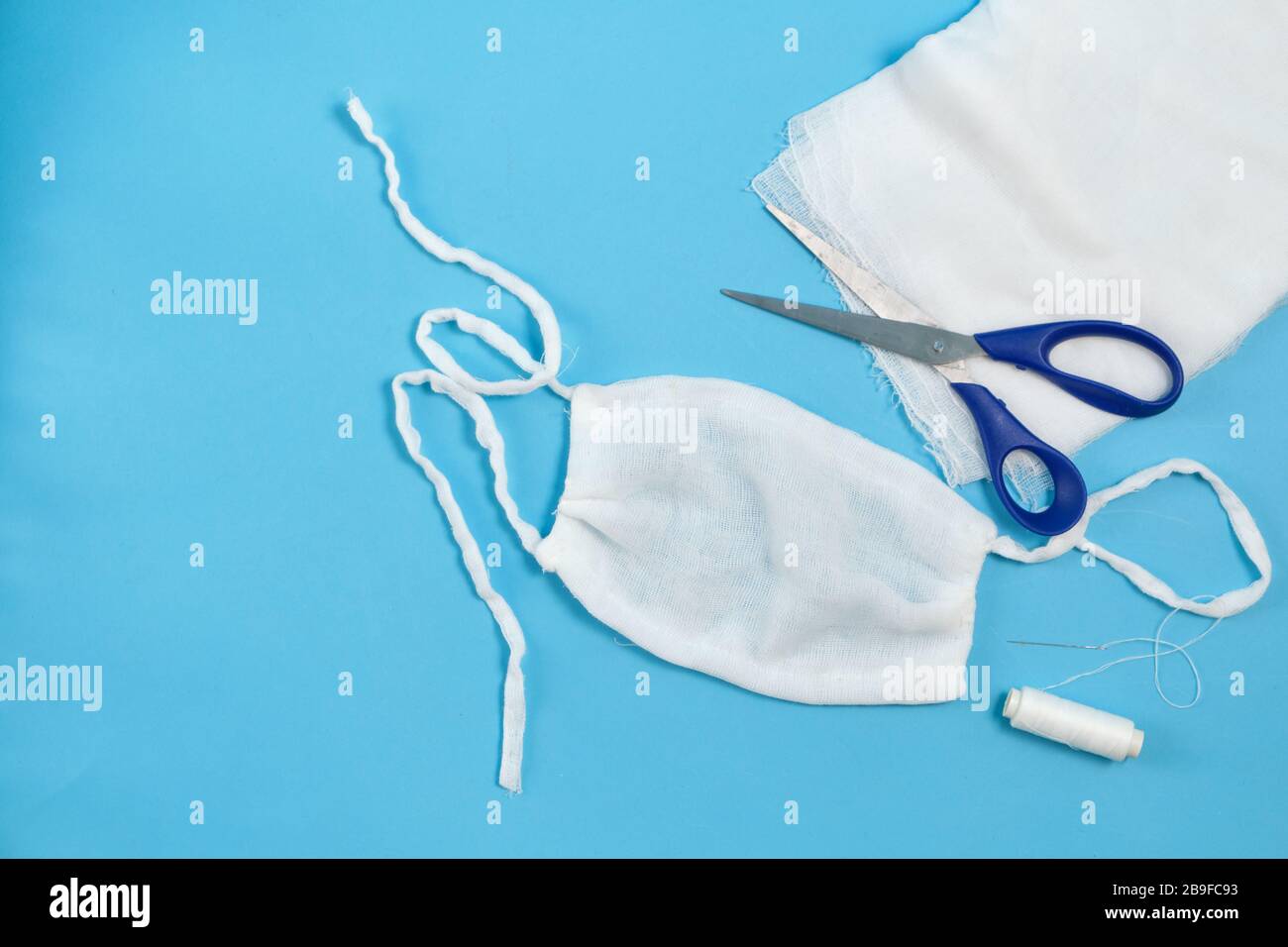 DIY mask during a pandemic quarantine. The concept of deficiency Stock ...